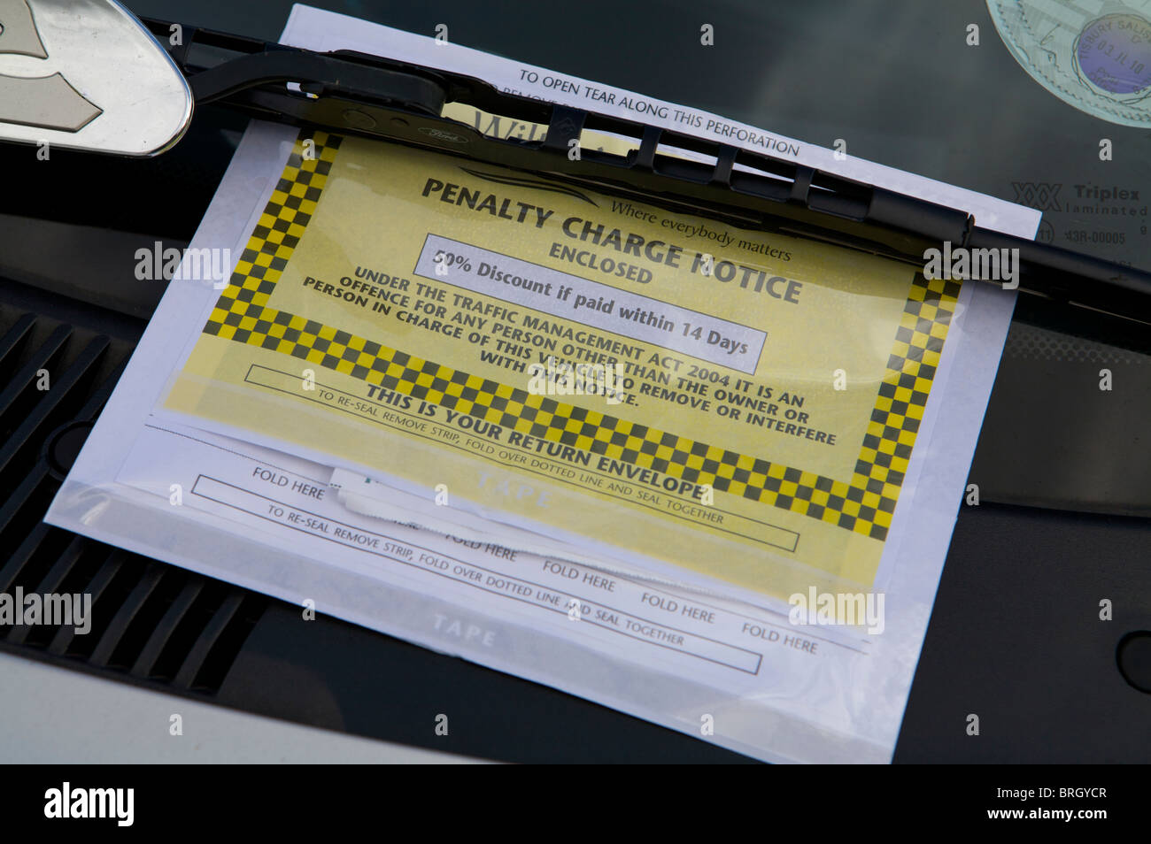 Parking ticket stuck to the windscreen of an illegally parked car Stock ... Parking ticket stuck to the windscreen of an illegally parked car Stock ...