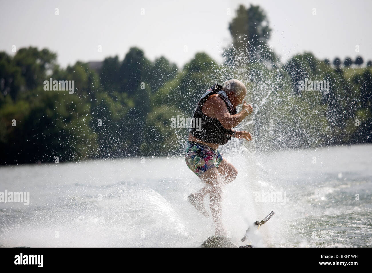 Senior citizen falling while water skiing on a Tennessee lake Stock ...