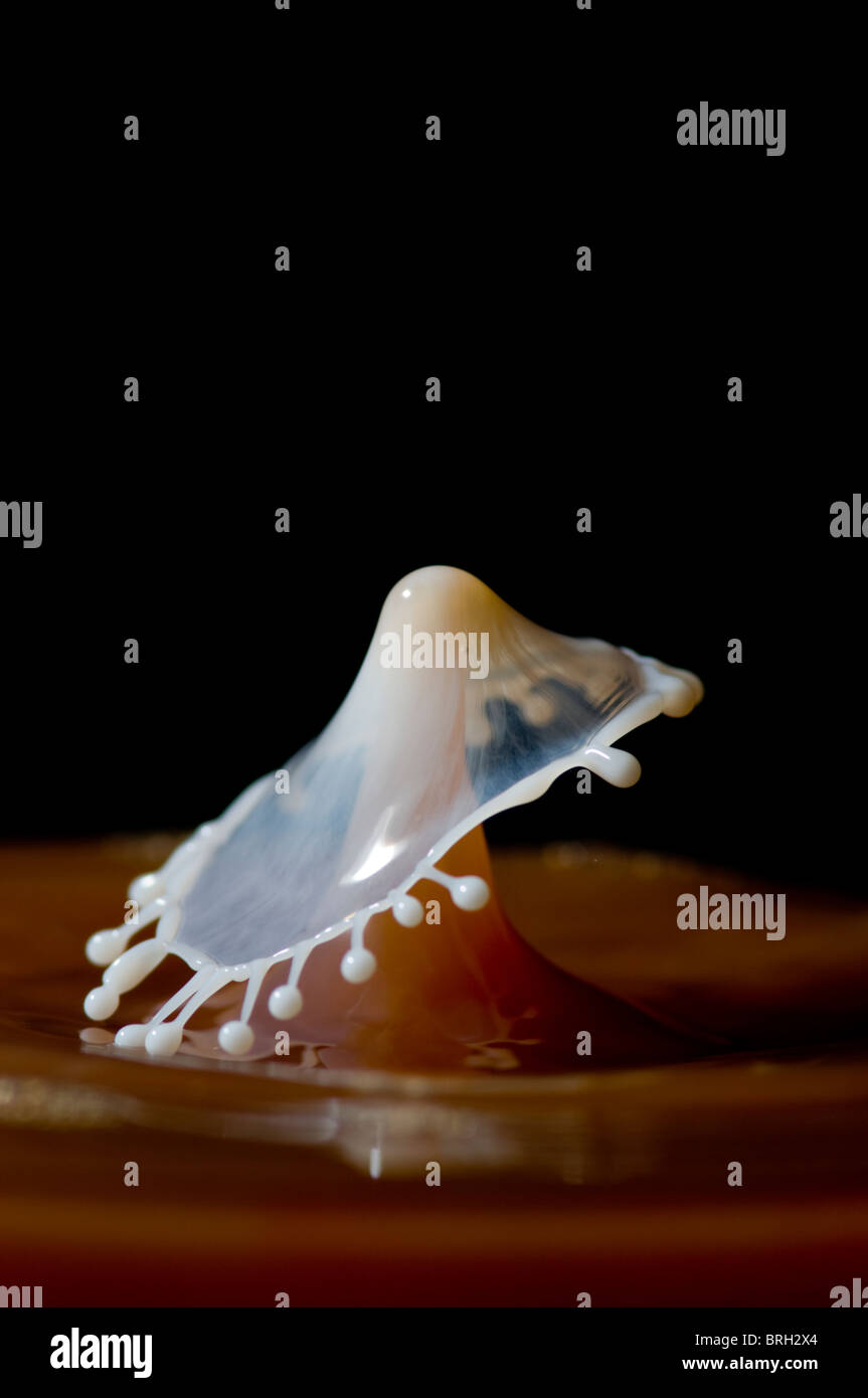 Fluid droplet collision captured with high speed photography Stock ...