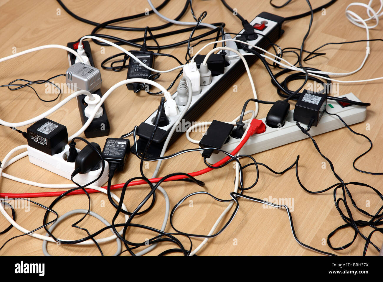 Home electrics, multi socket, power lines, plug board, plugs and ...