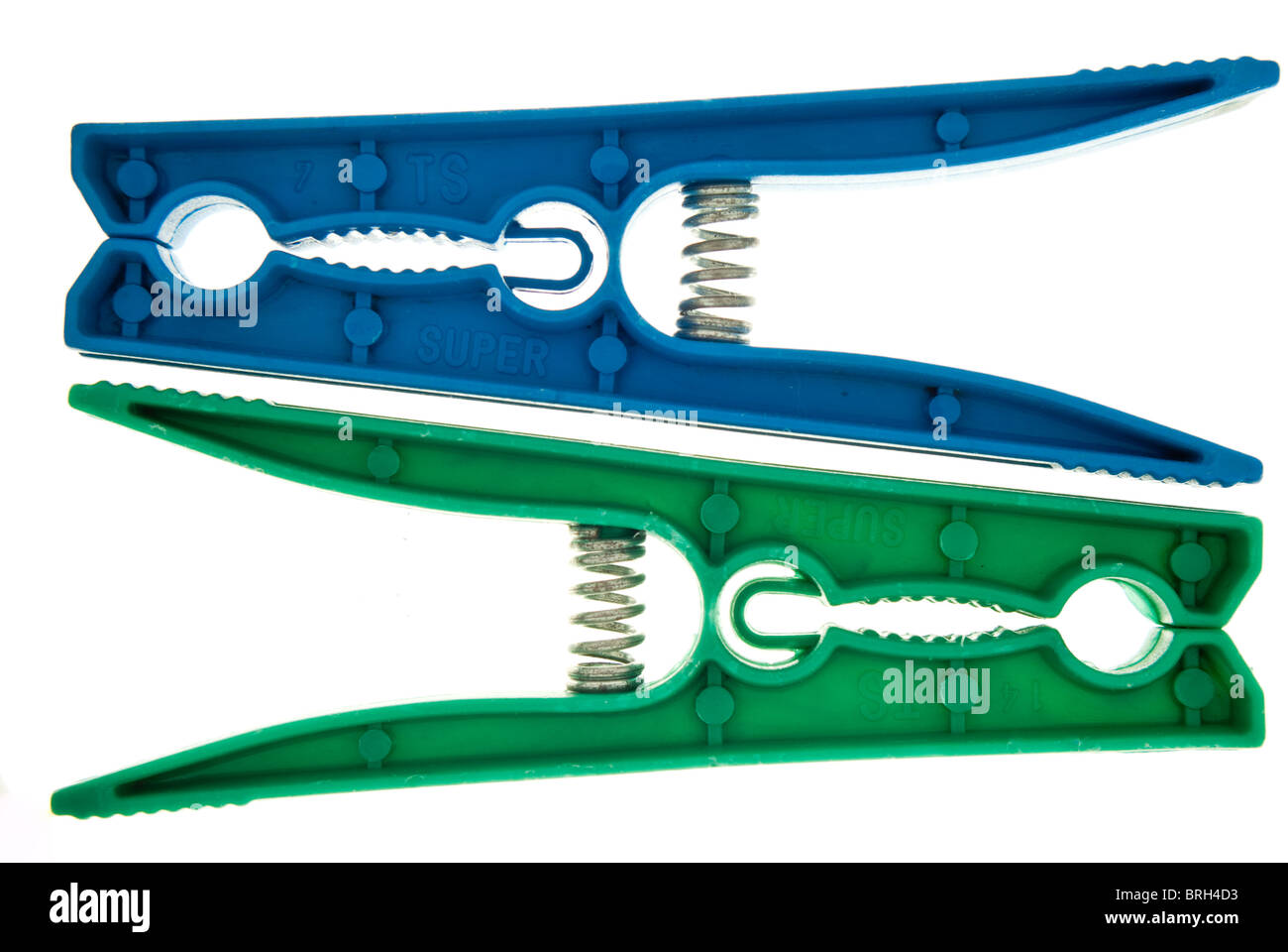 Large Clothes Pegs in green and blue isolated on white background Stock ...