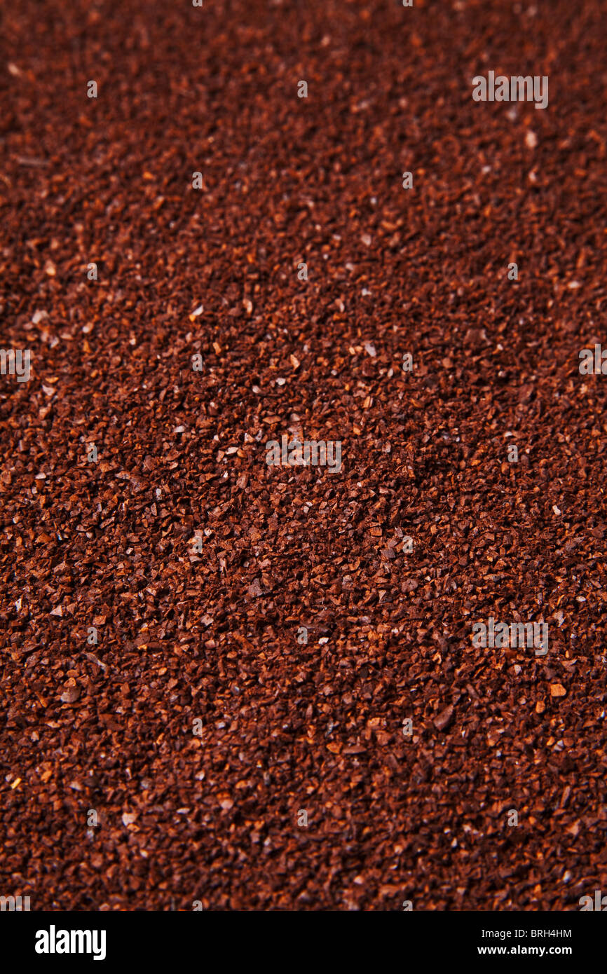 brown coffee grounds arranged as a background Stock Photo - Alamy