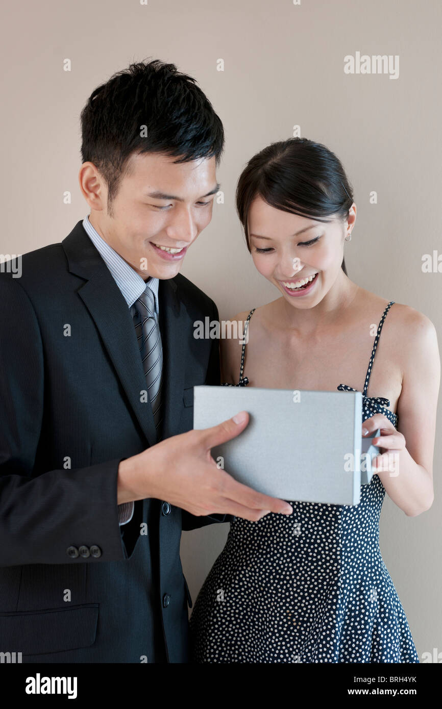 Tender moment of receiving gift Stock Photo - Alamy