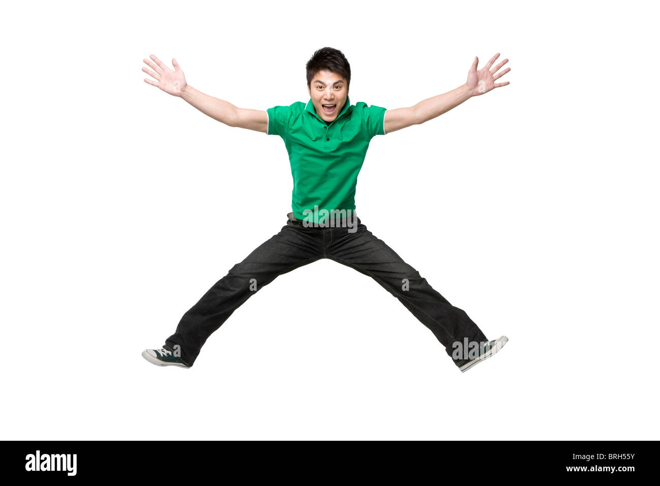 Young man in mid-air Stock Photo - Alamy