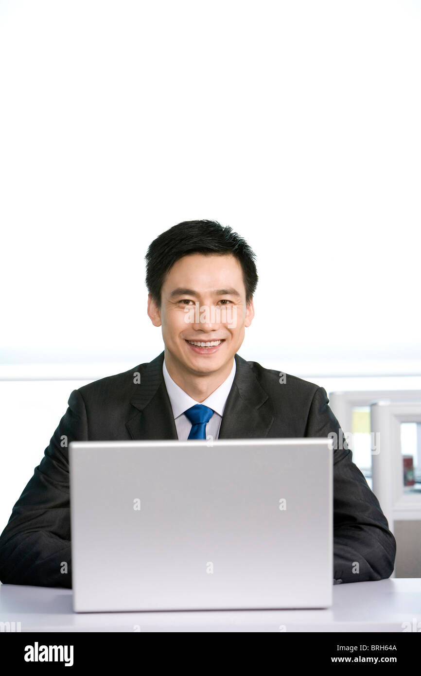 Office worker at his desk Stock Photo - Alamy