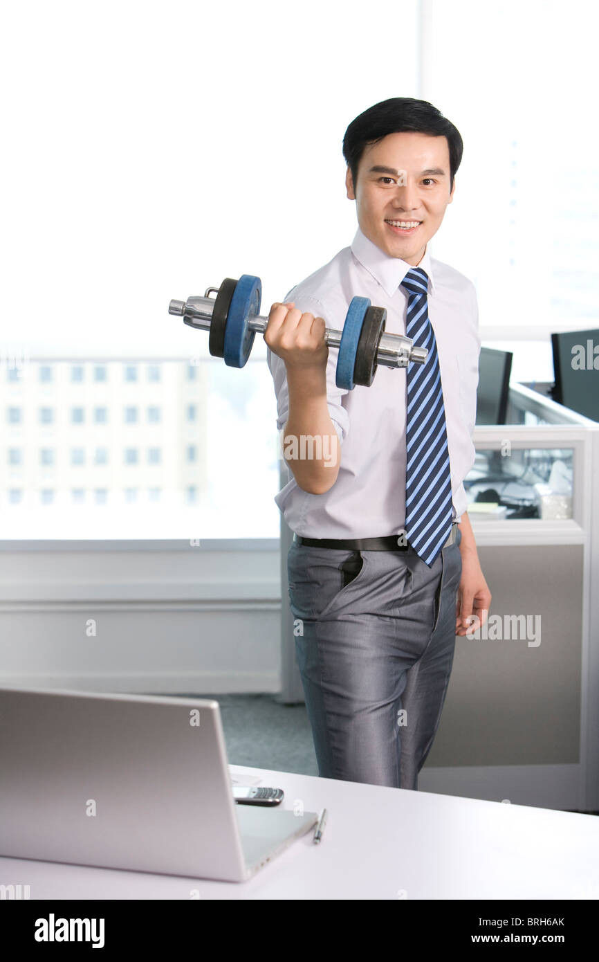 Working out in the office Stock Photo - Alamy