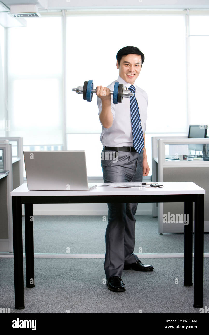 Working out in the office Stock Photo - Alamy
