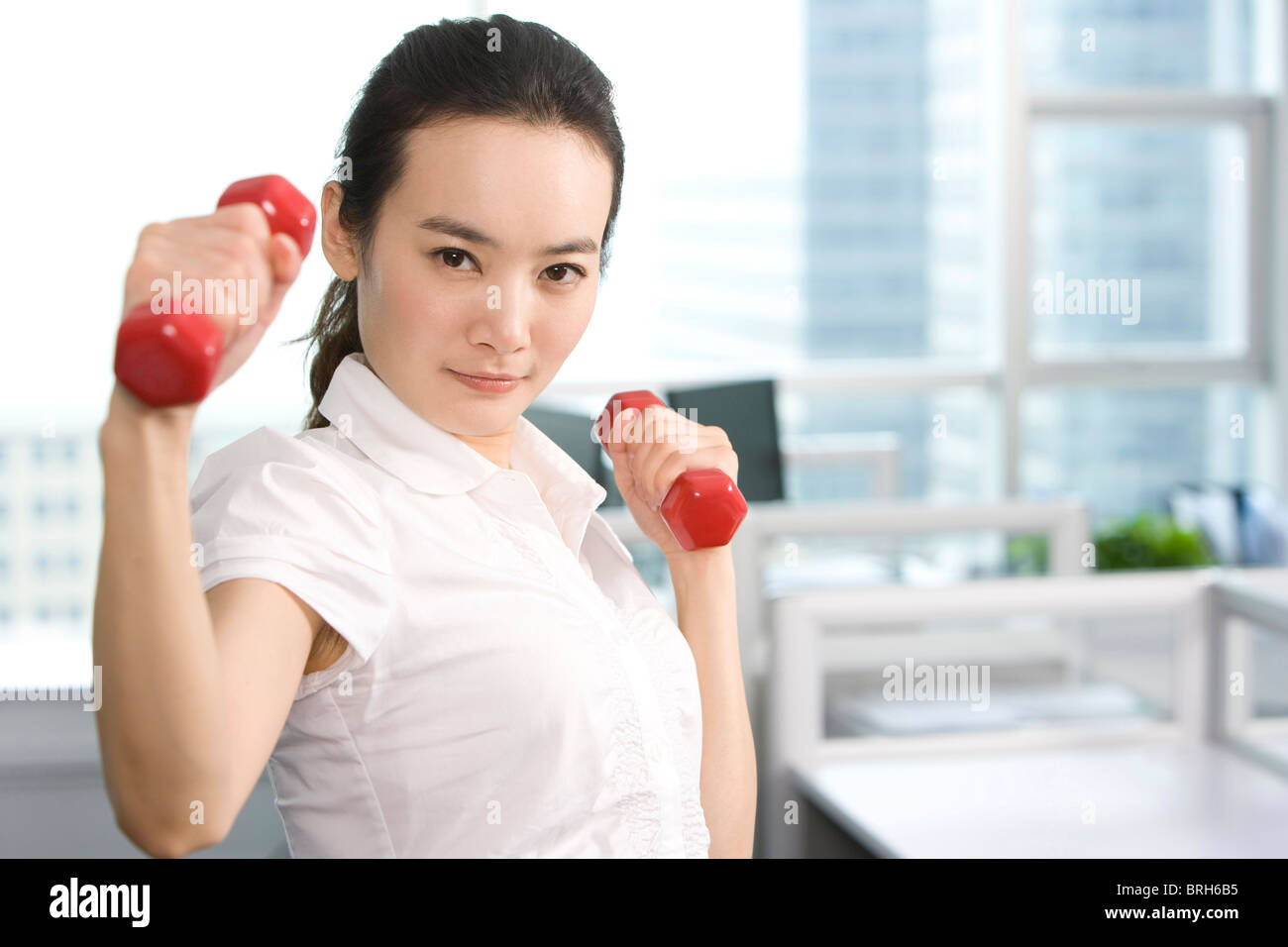 Working out in the office Stock Photo - Alamy