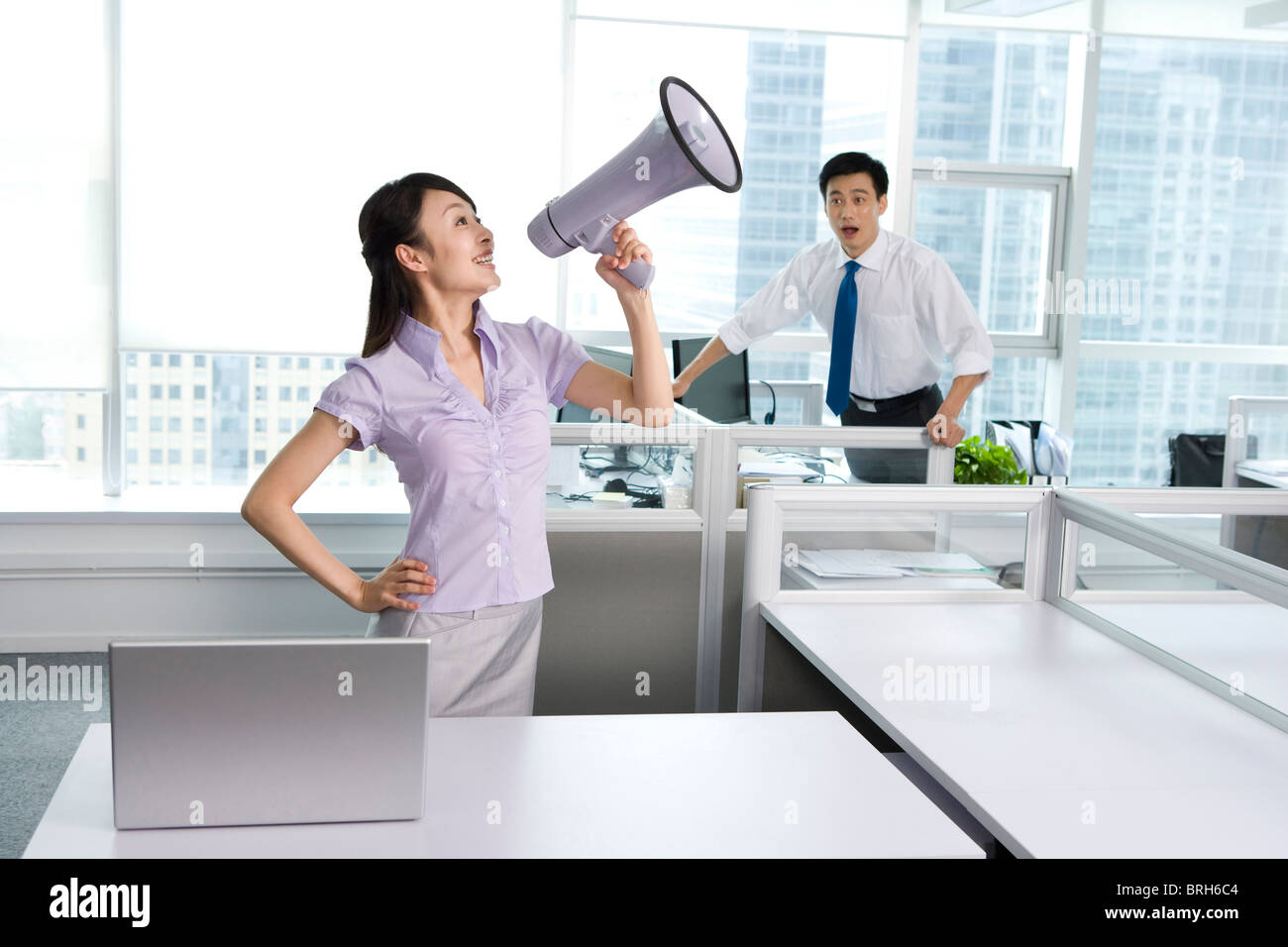 Getting loud in the office Stock Photo - Alamy