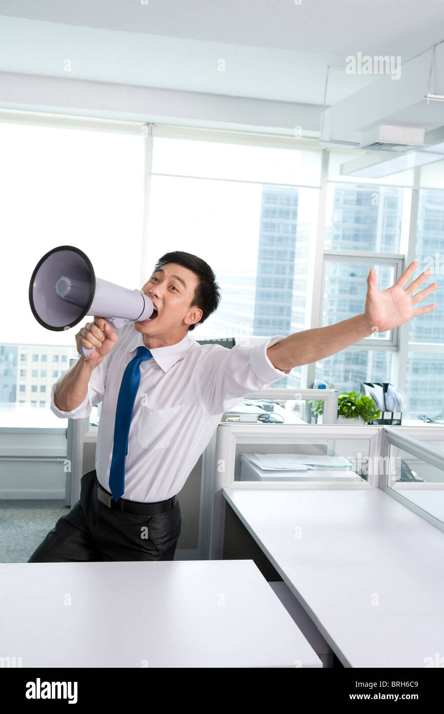 Getting loud in the office Stock Photo - Alamy