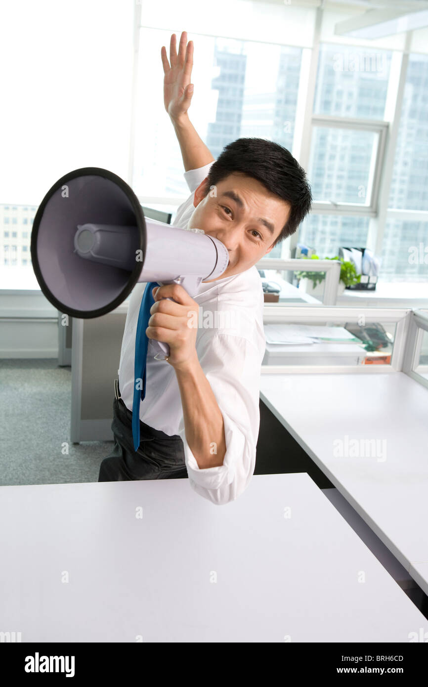 Getting loud in the office Stock Photo - Alamy