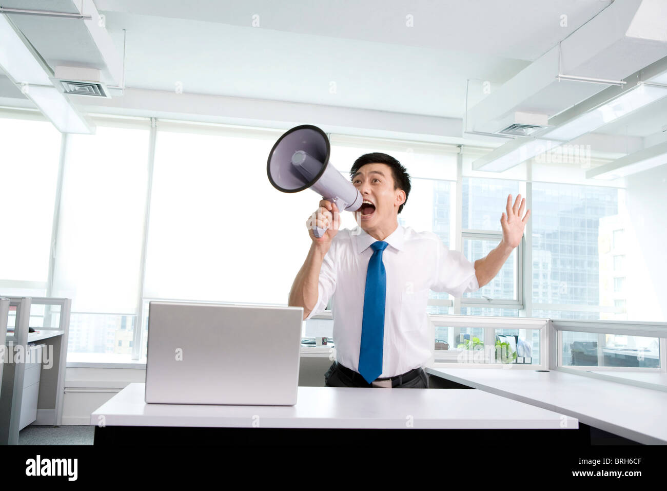 Getting loud in the office Stock Photo - Alamy