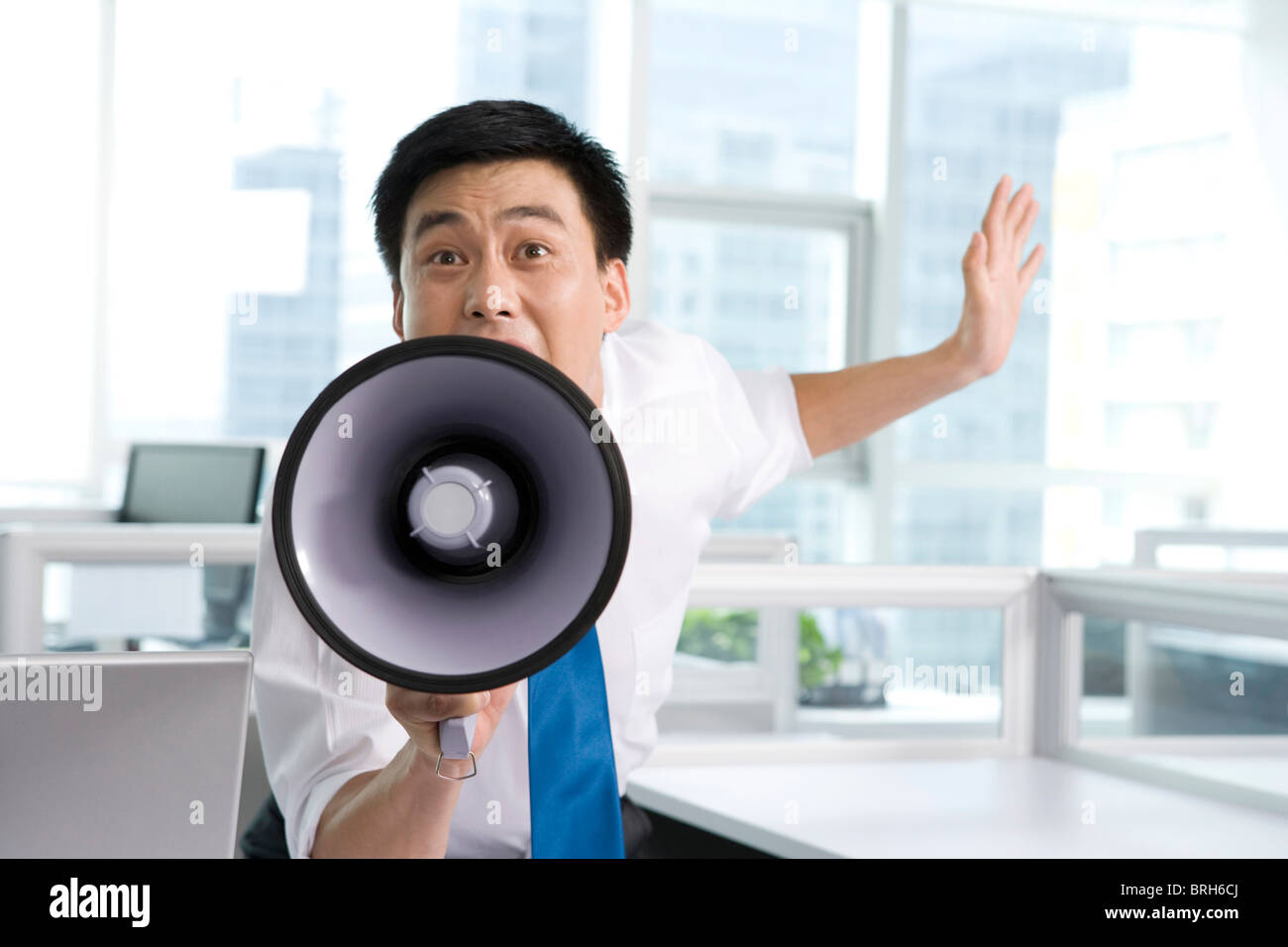 Getting loud in the office Stock Photo - Alamy