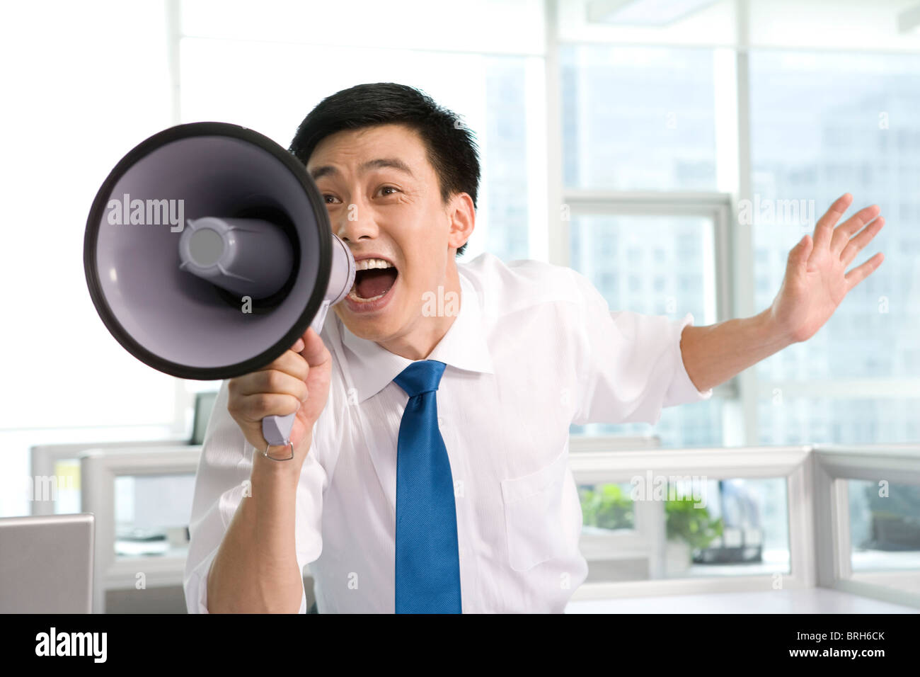 Getting loud in the office Stock Photo - Alamy