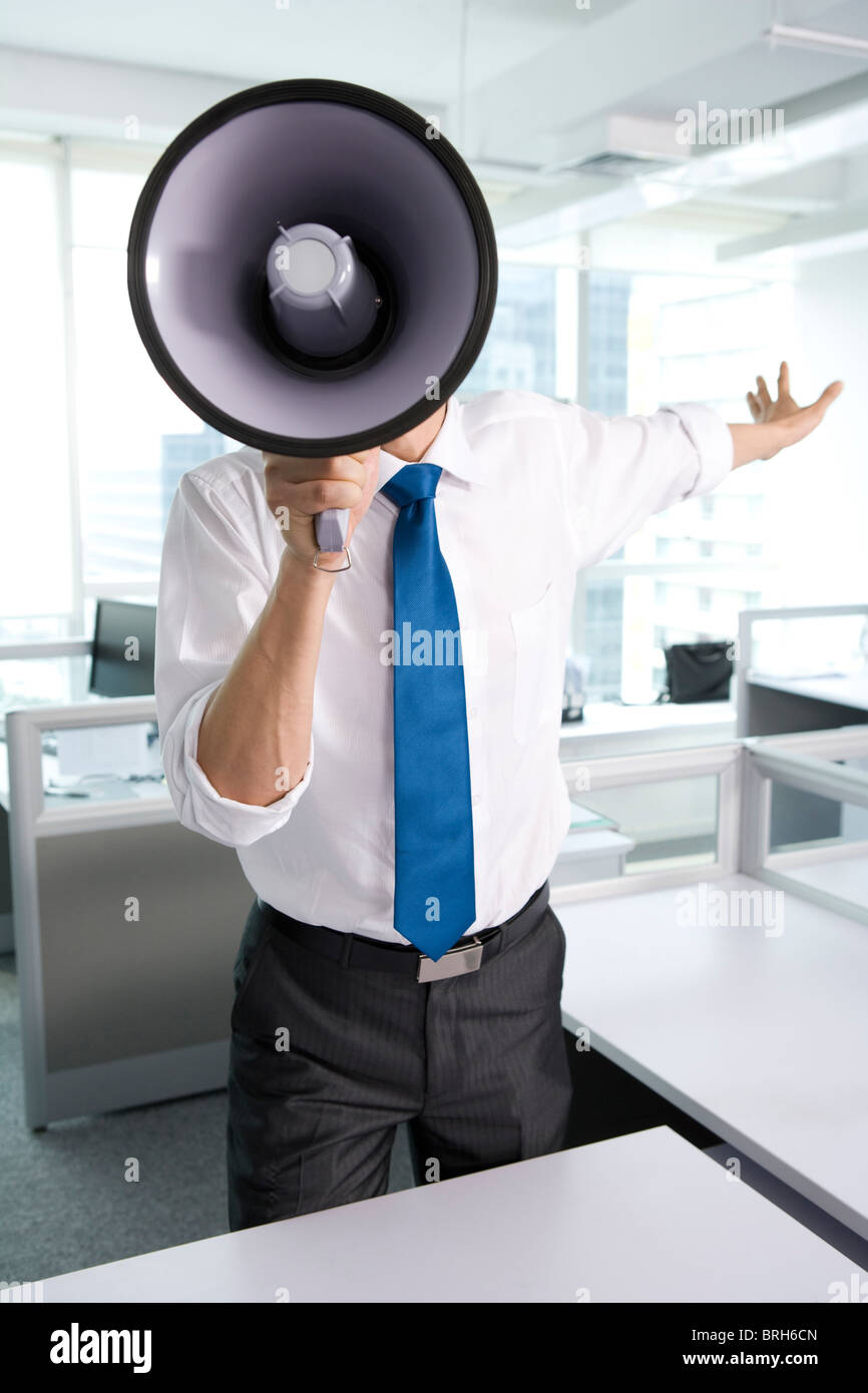 Getting loud in the office Stock Photo - Alamy