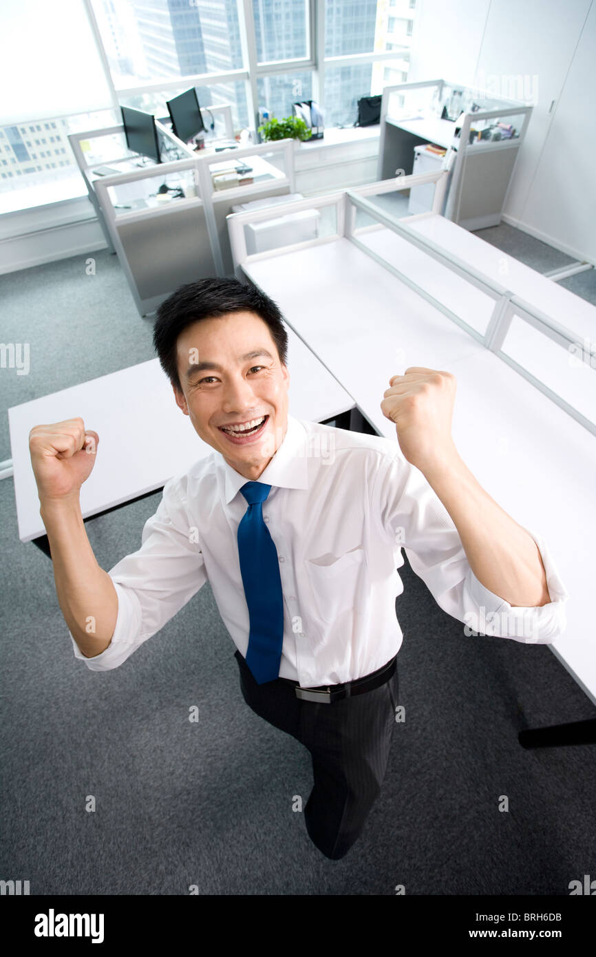 Happy office worker Stock Photo - Alamy