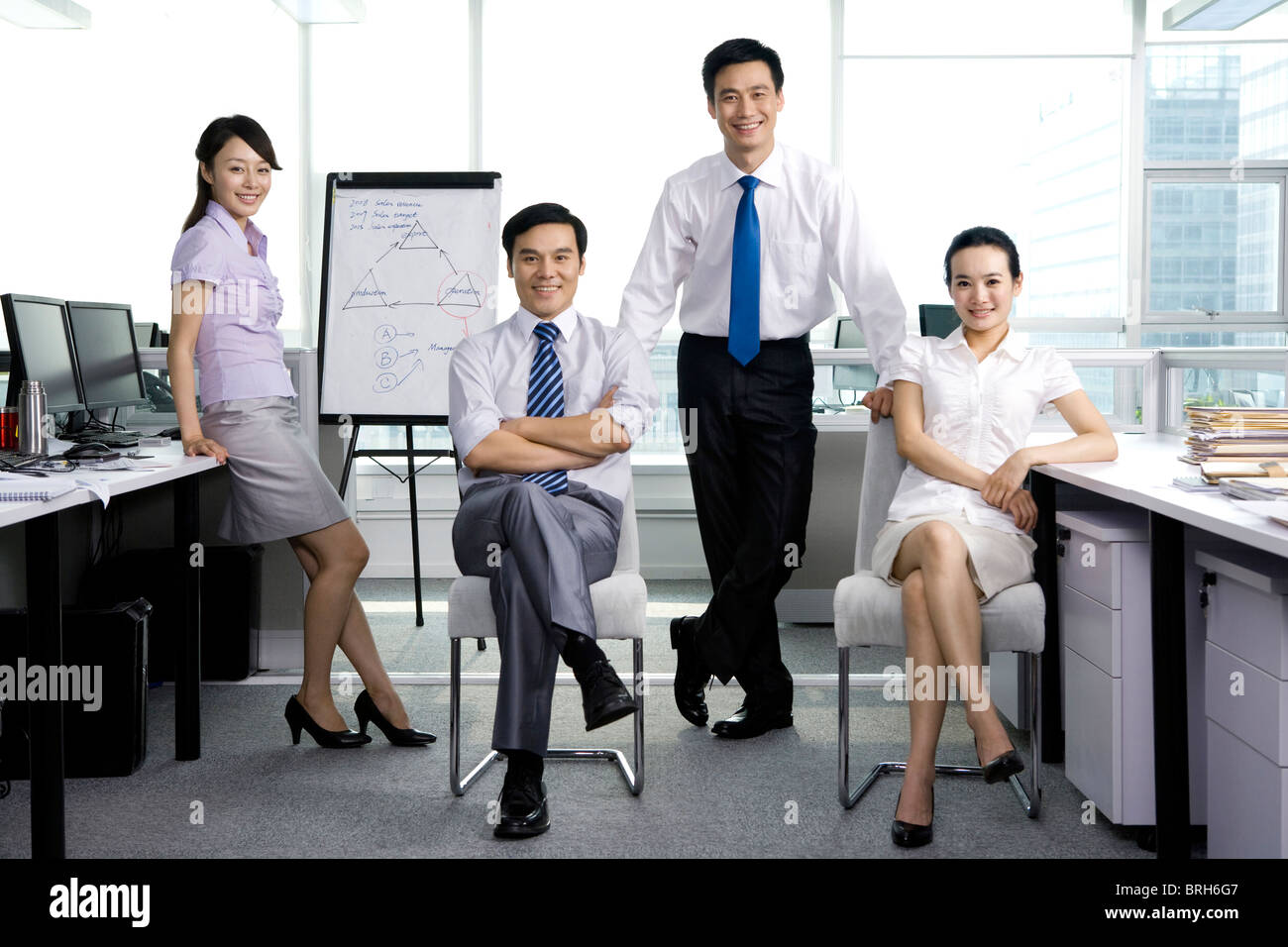 Cheering office workers Stock Photo - Alamy