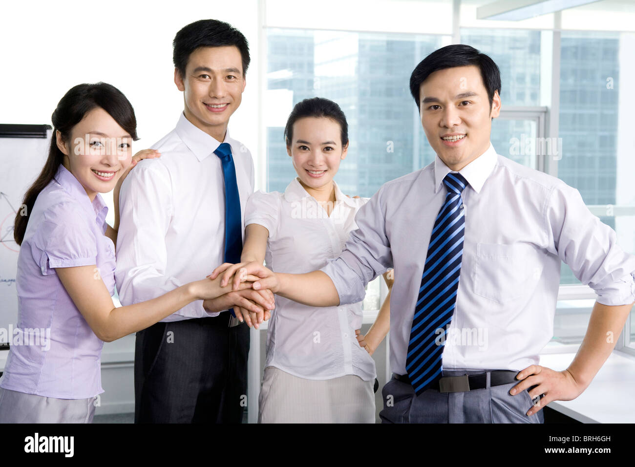 Cheering office workers Stock Photo - Alamy