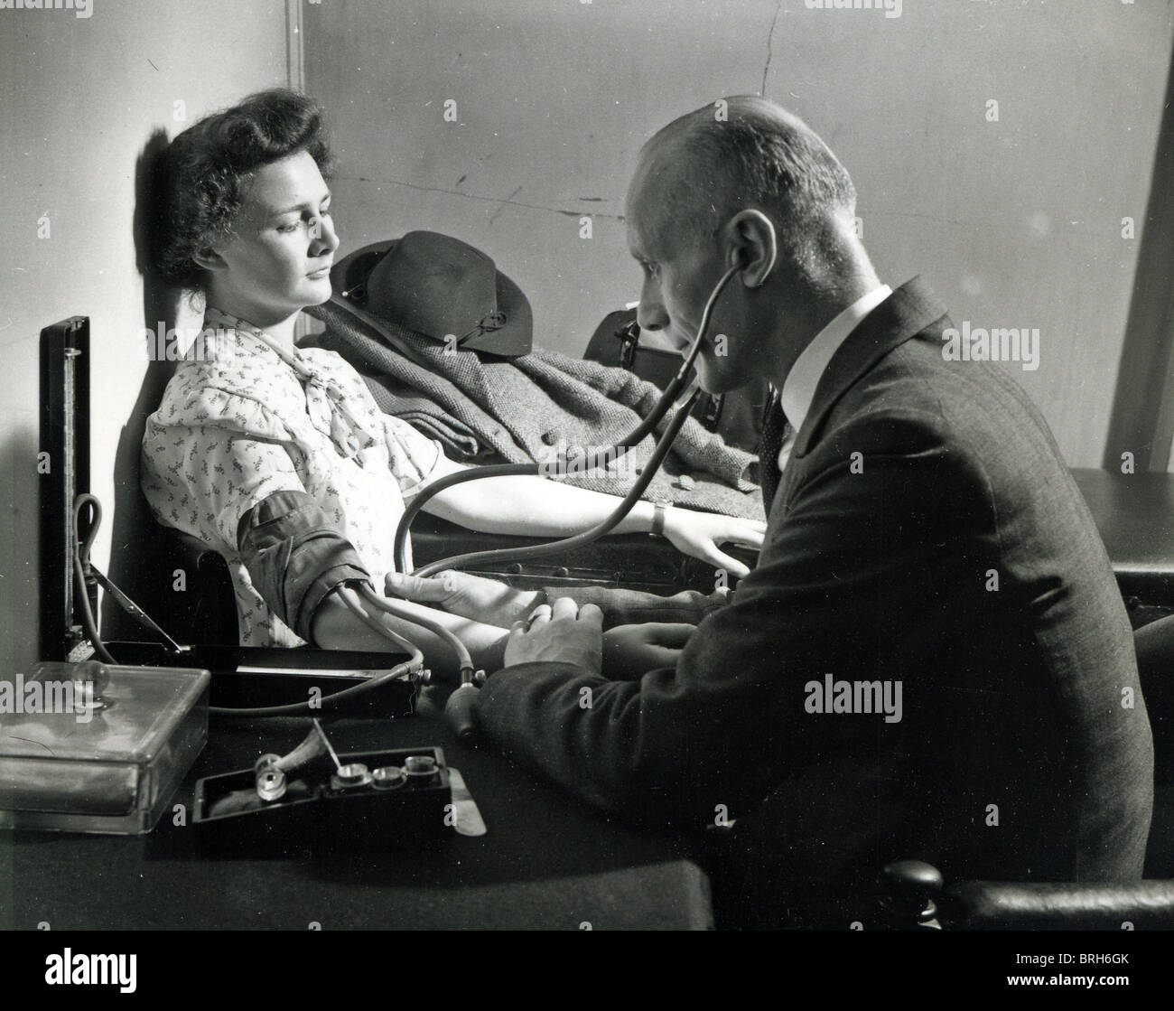BLOOD PRESSURE A London family doctor taking blood pressure in 1940 ...