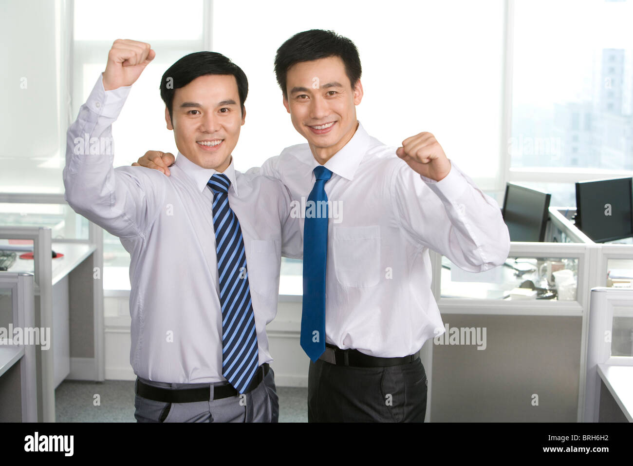 Cheering office workers Stock Photo - Alamy