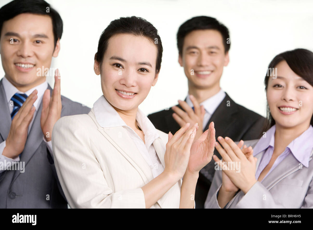 Cheering office workers Stock Photo - Alamy
