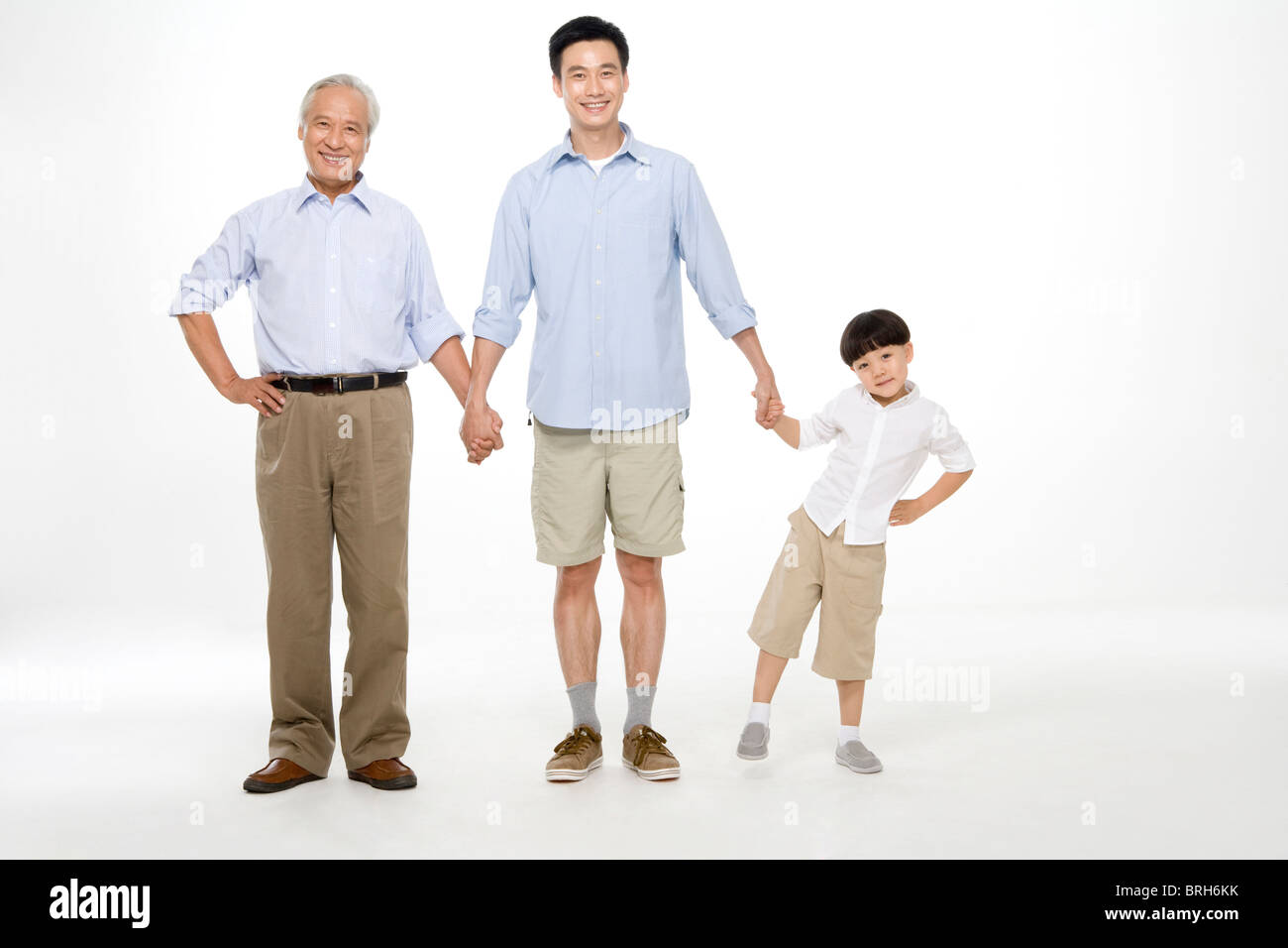 Portrait of three generations of males Stock Photo - Alamy