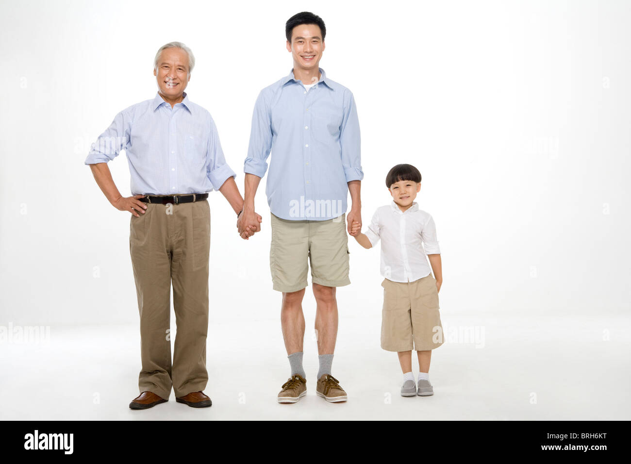 Portrait of three generations of males Stock Photo - Alamy