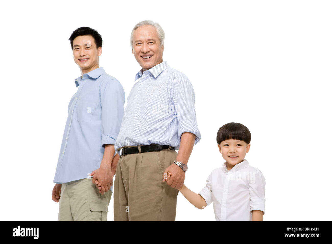 Portrait of three generations of males Stock Photo - Alamy