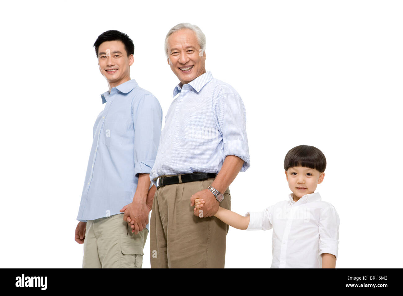 Portrait of three generations of males Stock Photo - Alamy