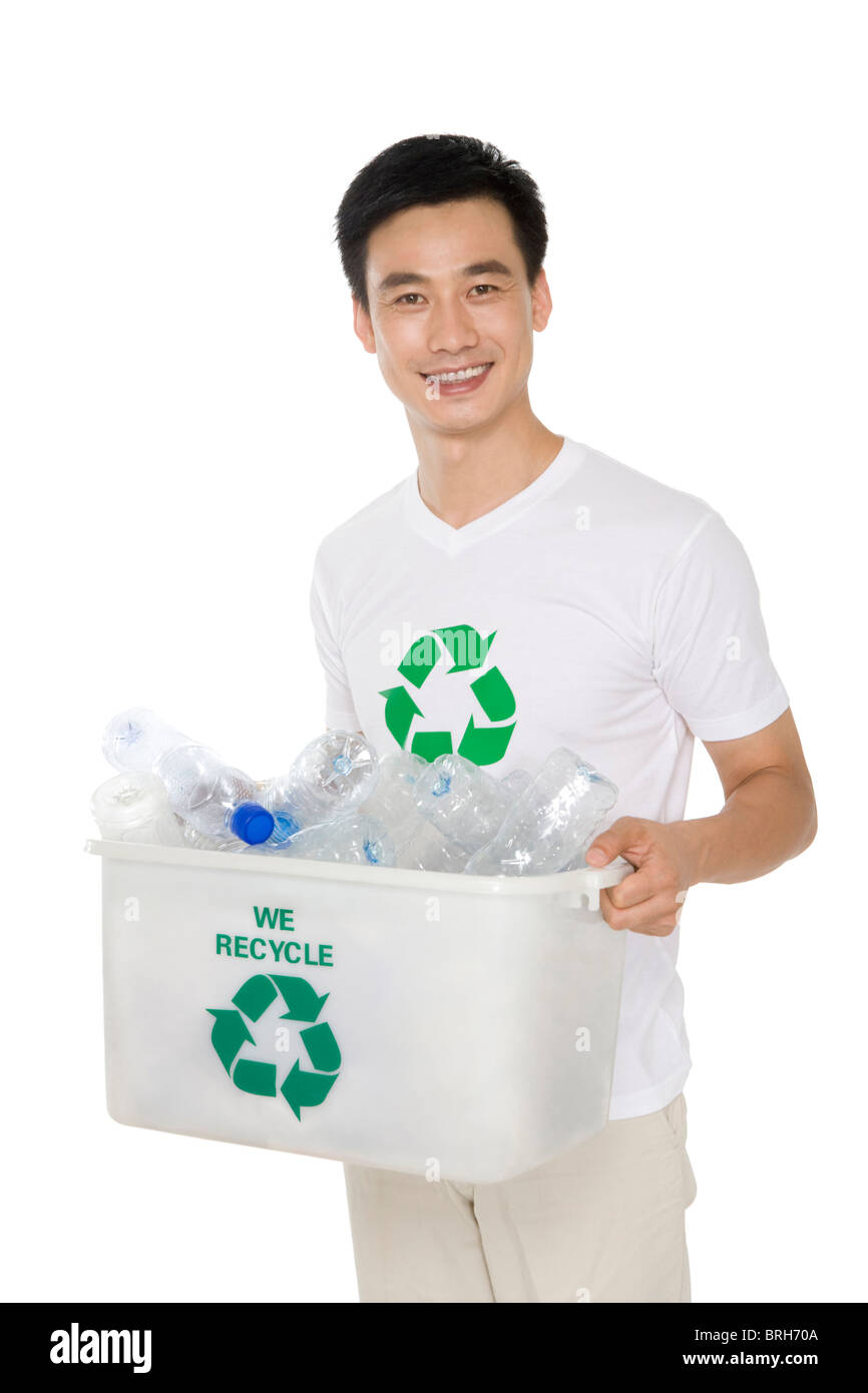 Mid-Adult man recycling Stock Photo - Alamy