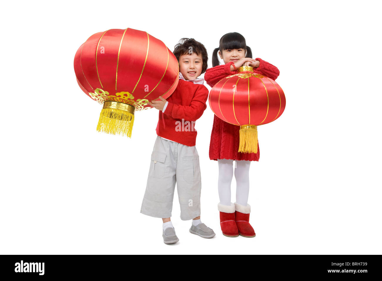 Kids celebrating Chinese New Years Stock Photo - Alamy
