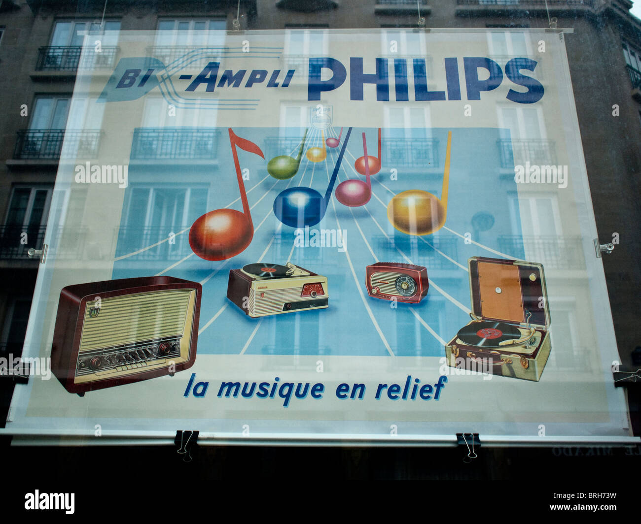 an old stereo poster in a Paris window Stock Photo - Alamy