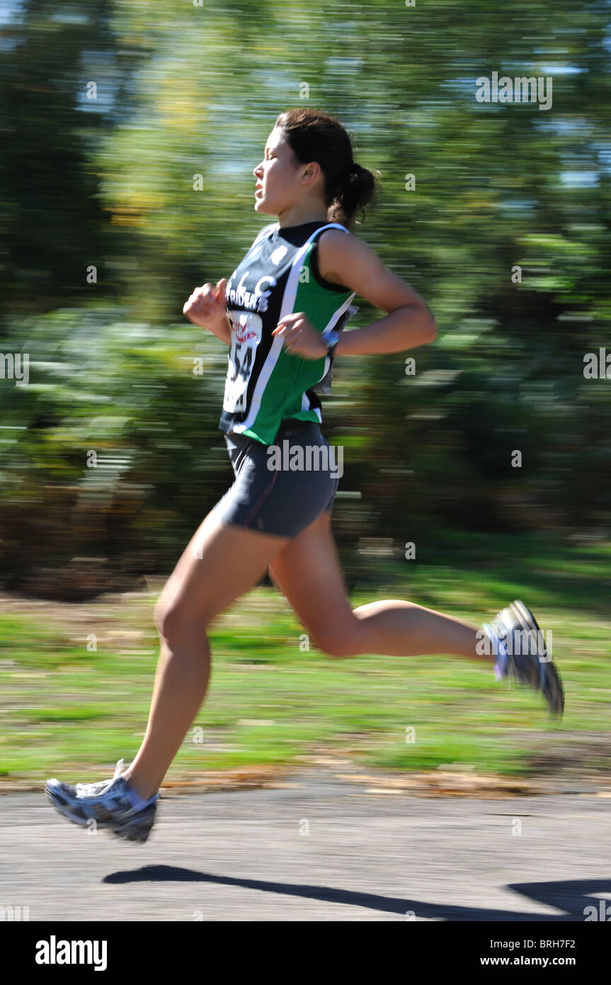 Woman runner in Sutton Park, West Midlands, England, UK Stock Photo - Alamy