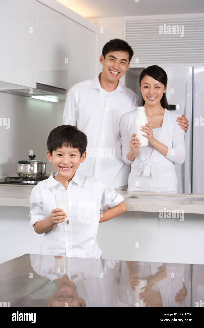 Family in modern kitchen Stock Photo - Alamy