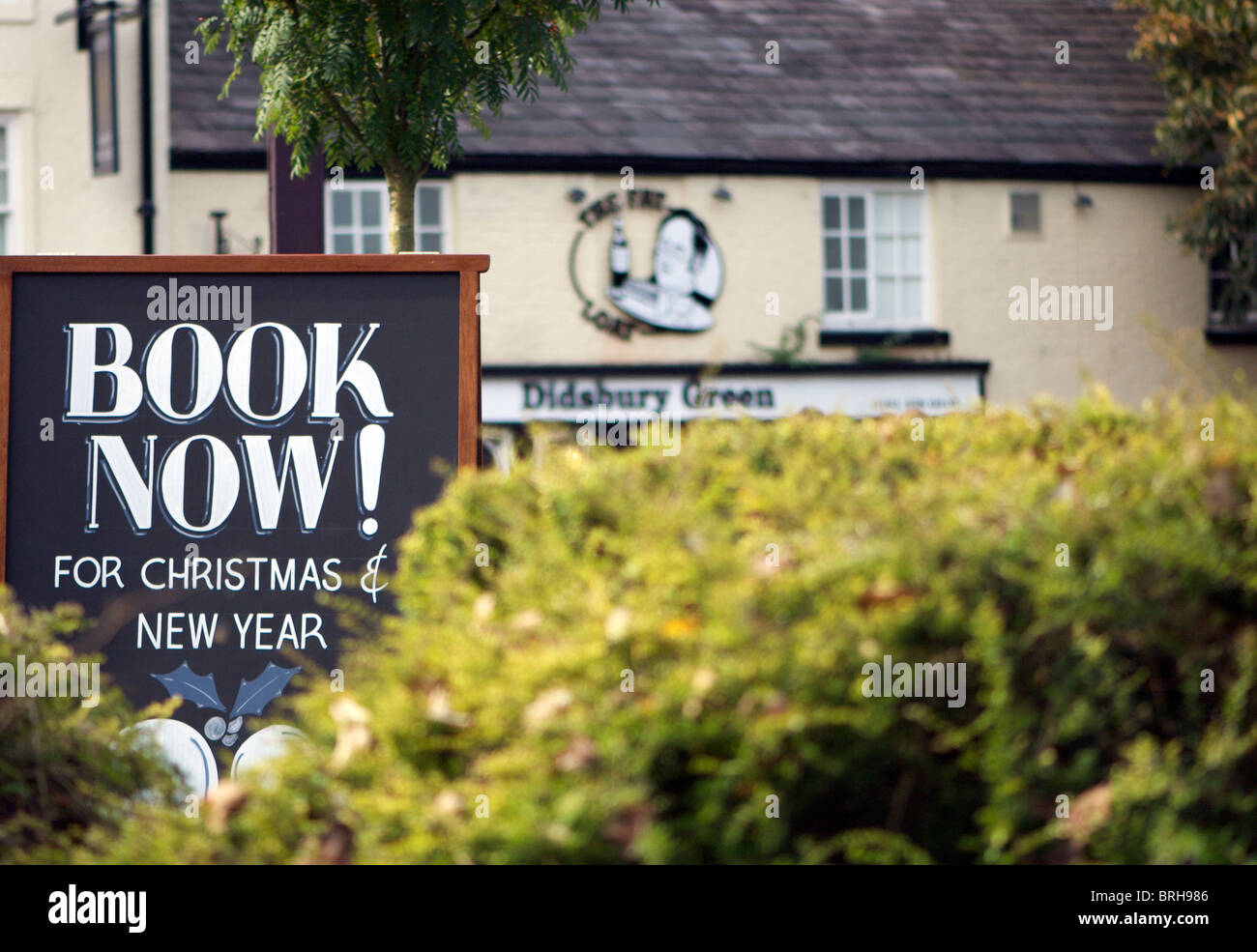 sign advertising Christmas and New Year bookings Stock Photo - Alamy