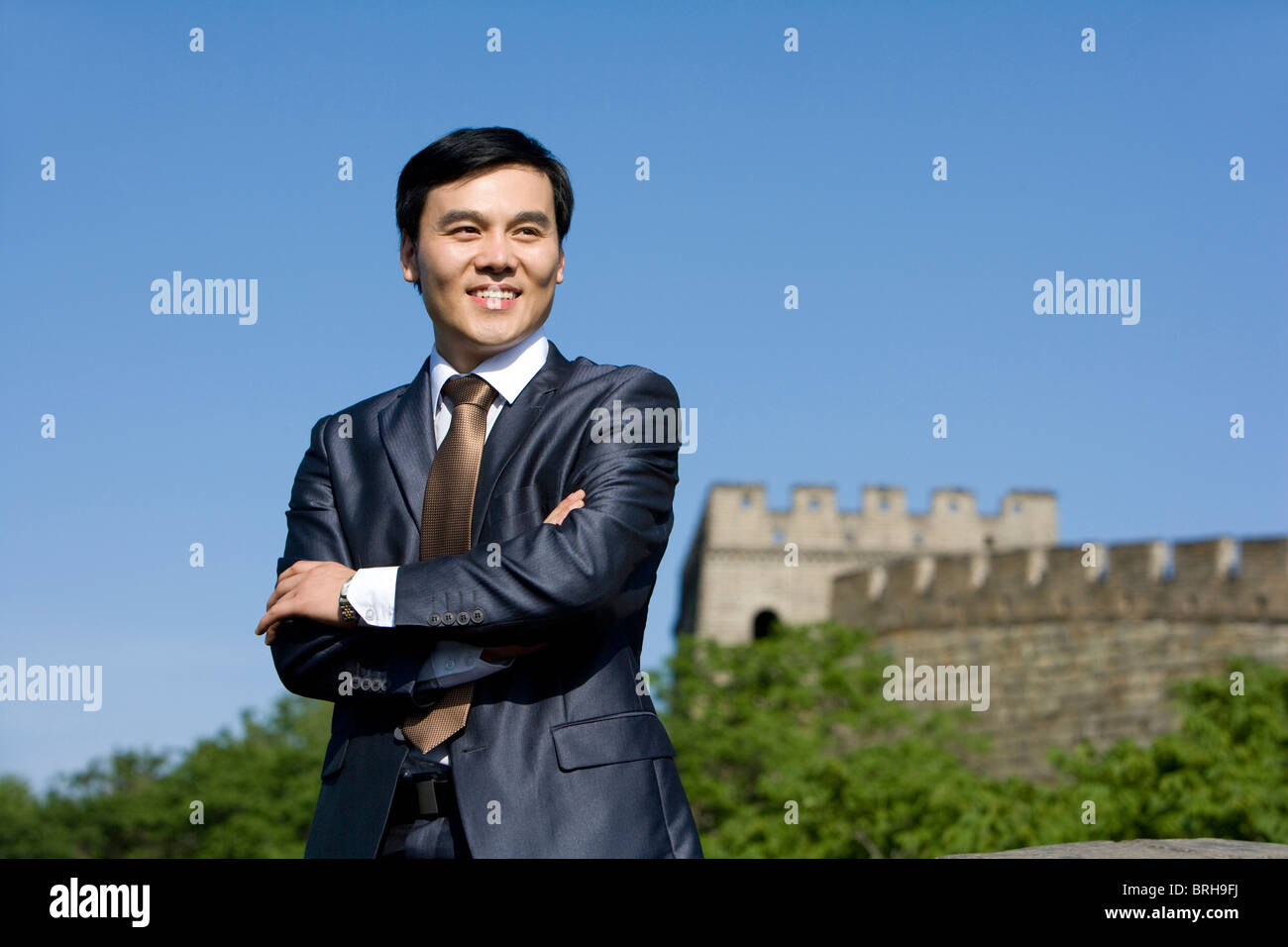 Businessman on the Great Wall Stock Photo - Alamy