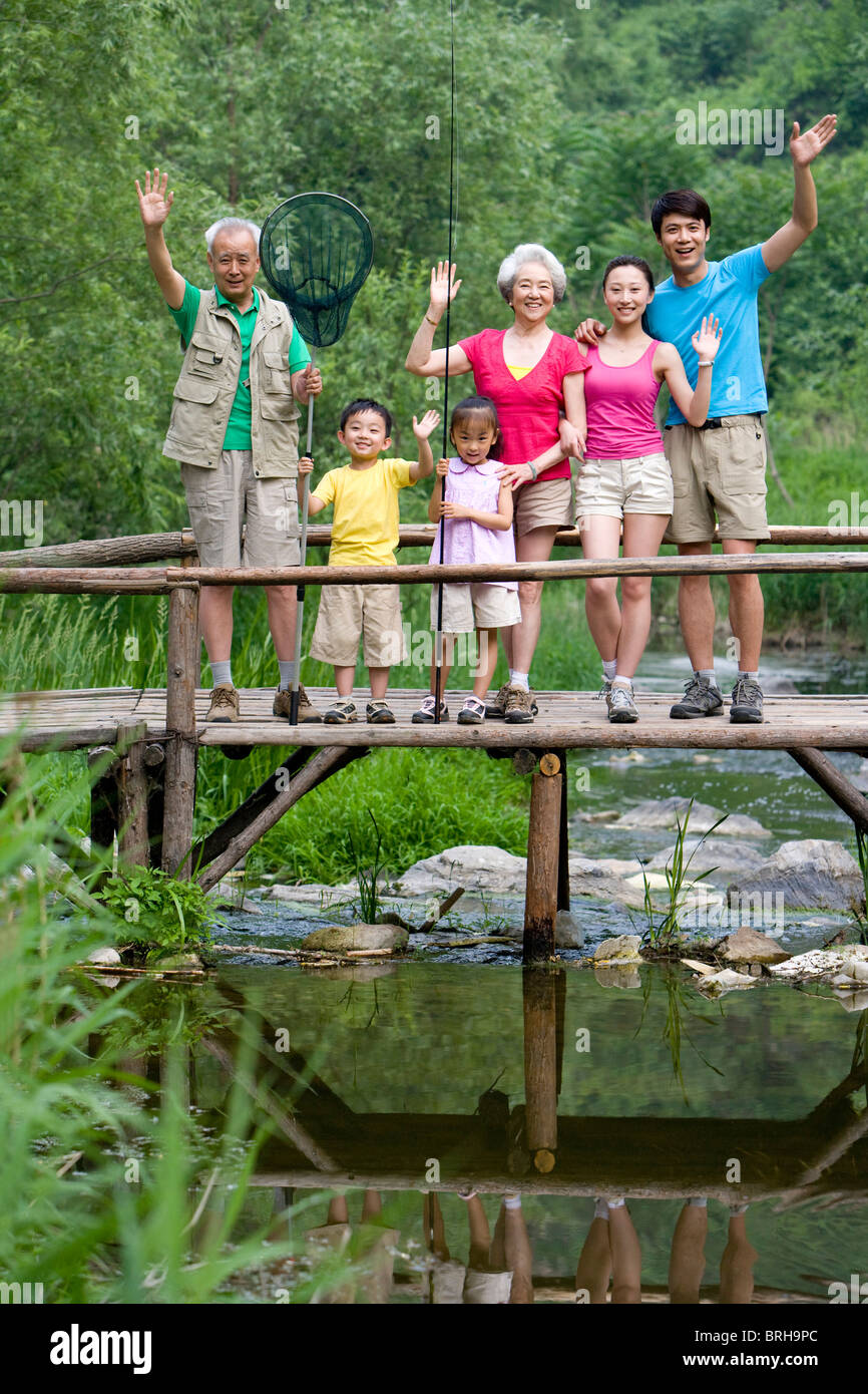 Portrait of family fishing Stock Photo - Alamy
