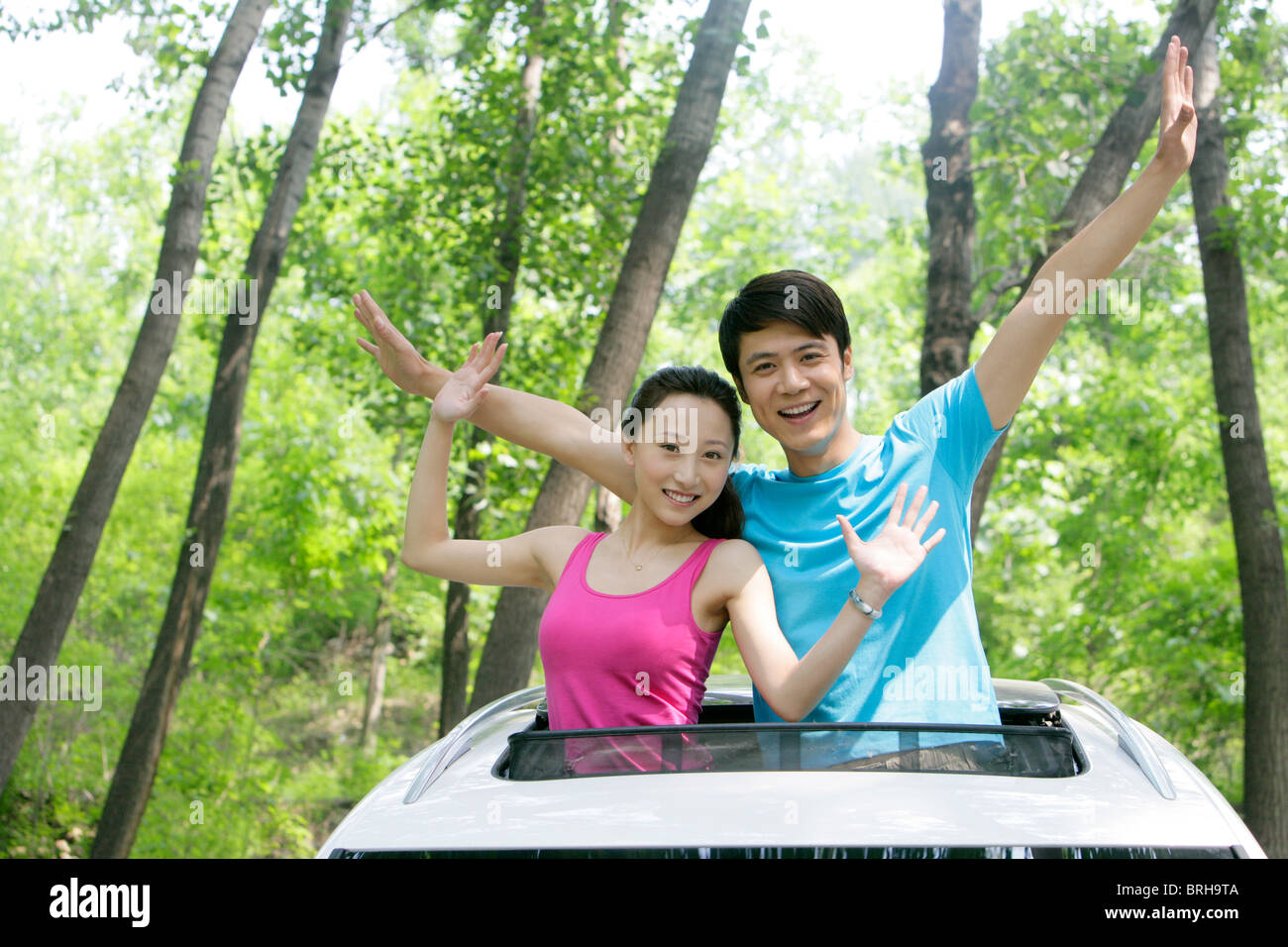 Couple on a road trip Stock Photo - Alamy