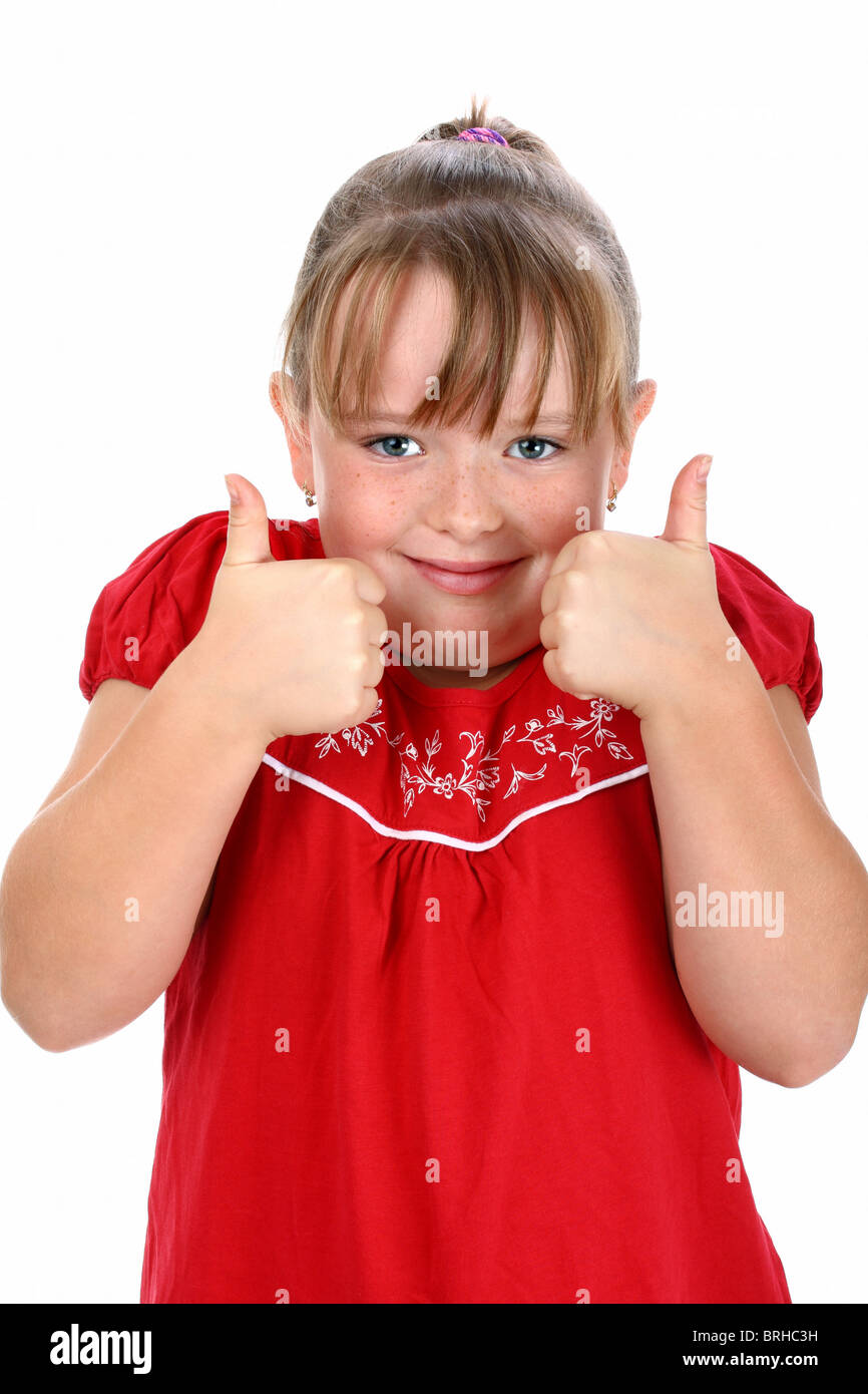 Small girl showing thumbs up gesture isolated on white Stock Photo - Alamy