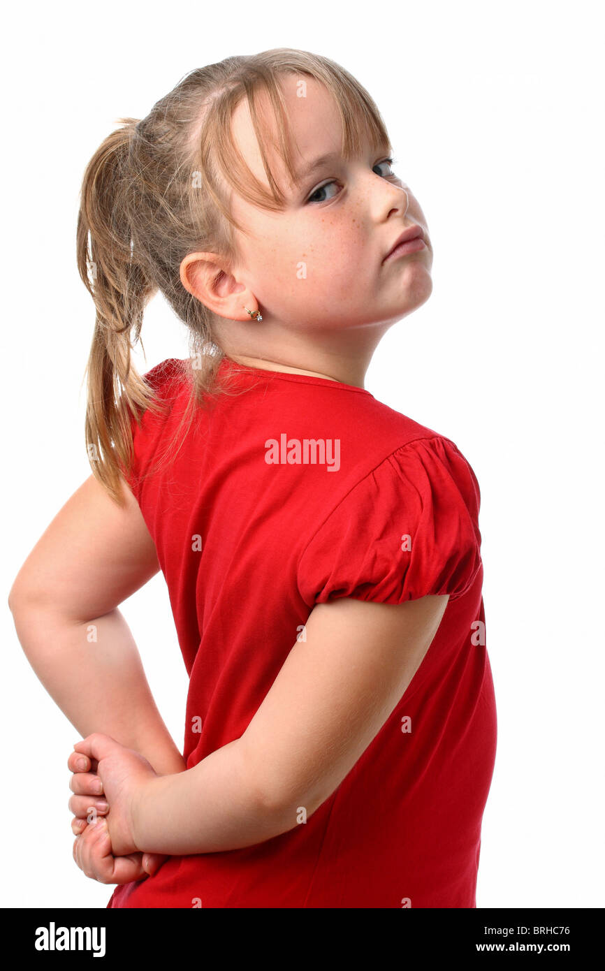 Small girl looking back over her shoulder isolated on white Stock Photo ...