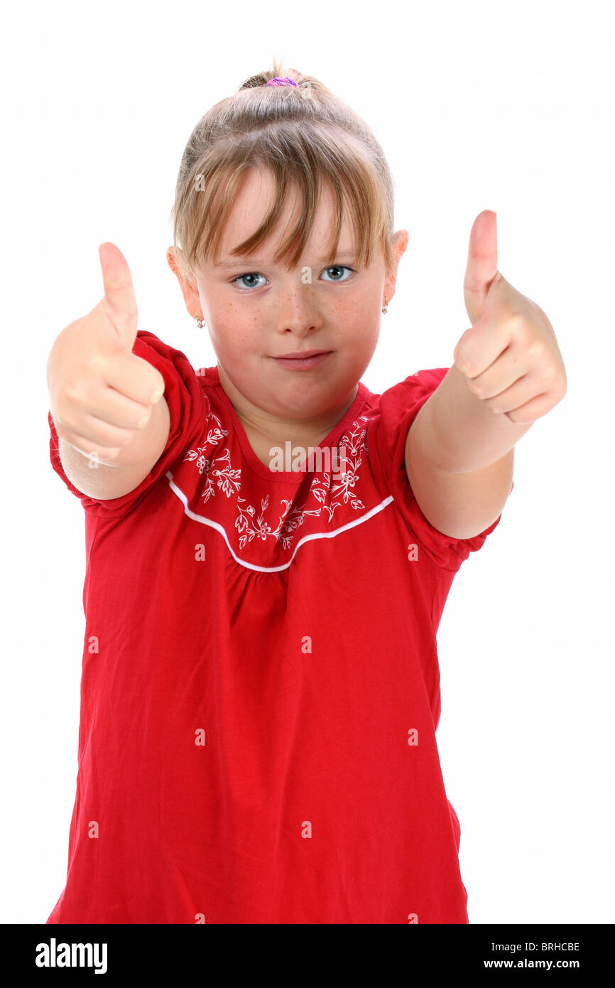 Small girl showing thumbs up gesture isolated on white Stock Photo - Alamy