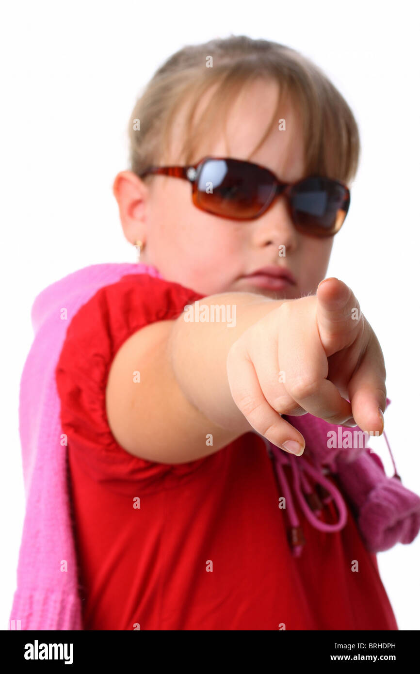 Small girl pointing her finger at camera isolated on white Stock Photo ...