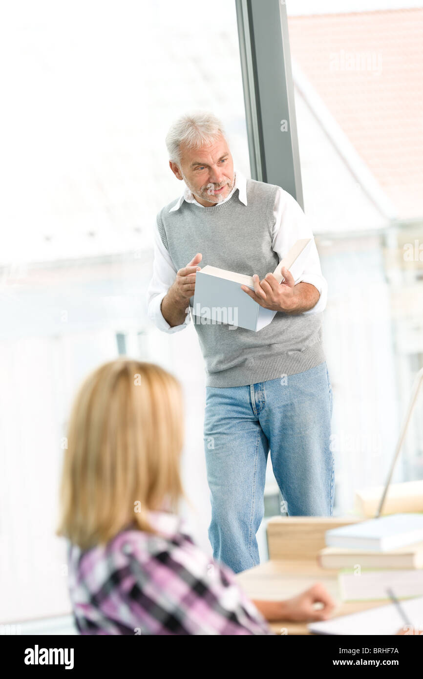 High school student with professor in classroom Stock Photo - Alamy