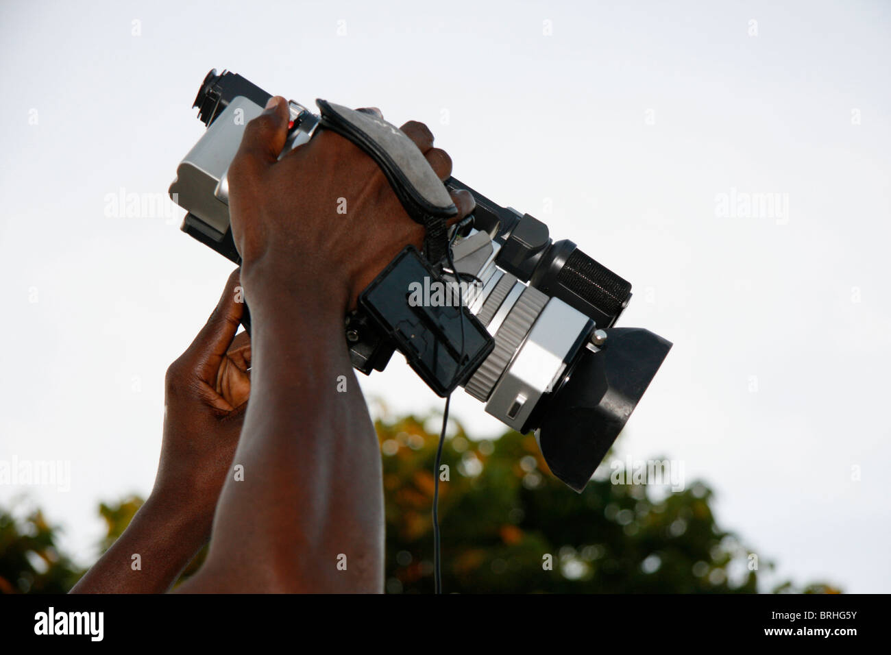 Film a video hi-res stock photography and images - Alamy