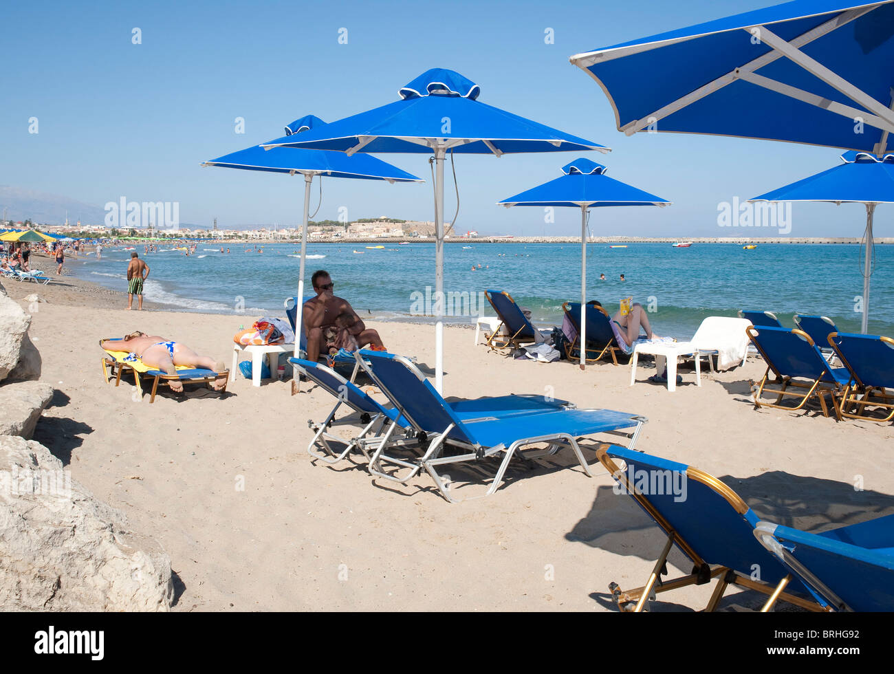 Blue parasols Rethymno beach Crete Greece Stock Photo - Alamy