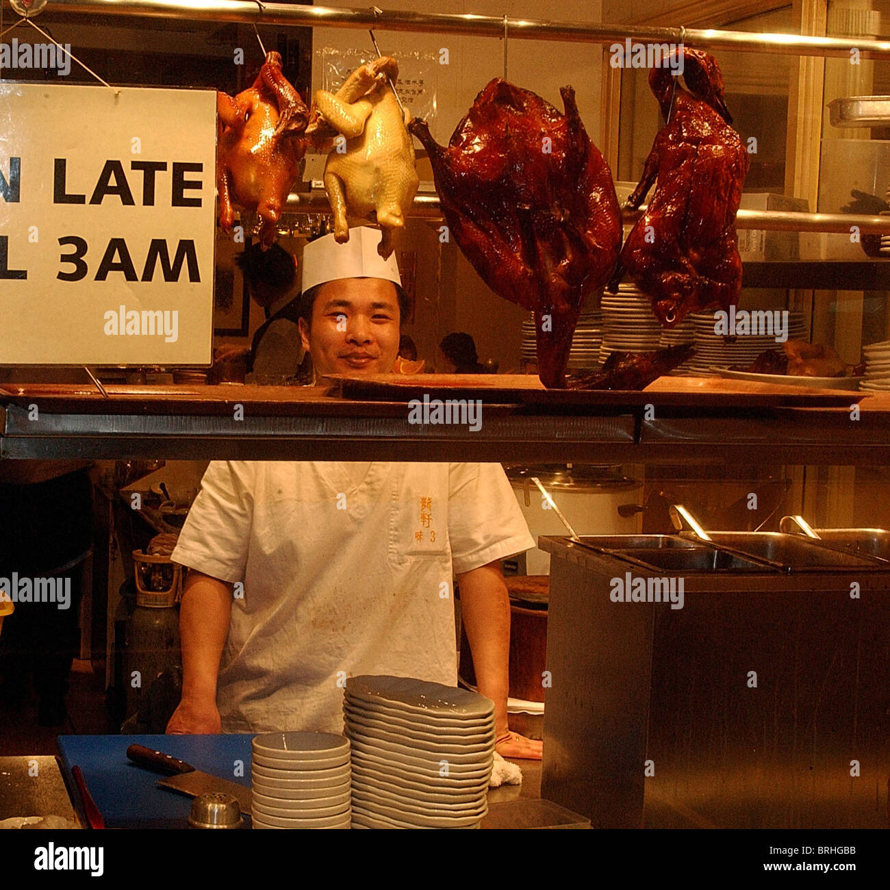 Chef at a chinese restaurant in Gerard St., London Stock Photo - Alamy