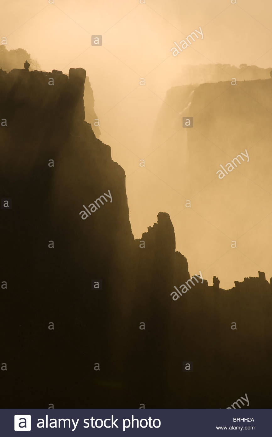 Mist over the cliffs of Victoria Falls Stock Photo - Alamy