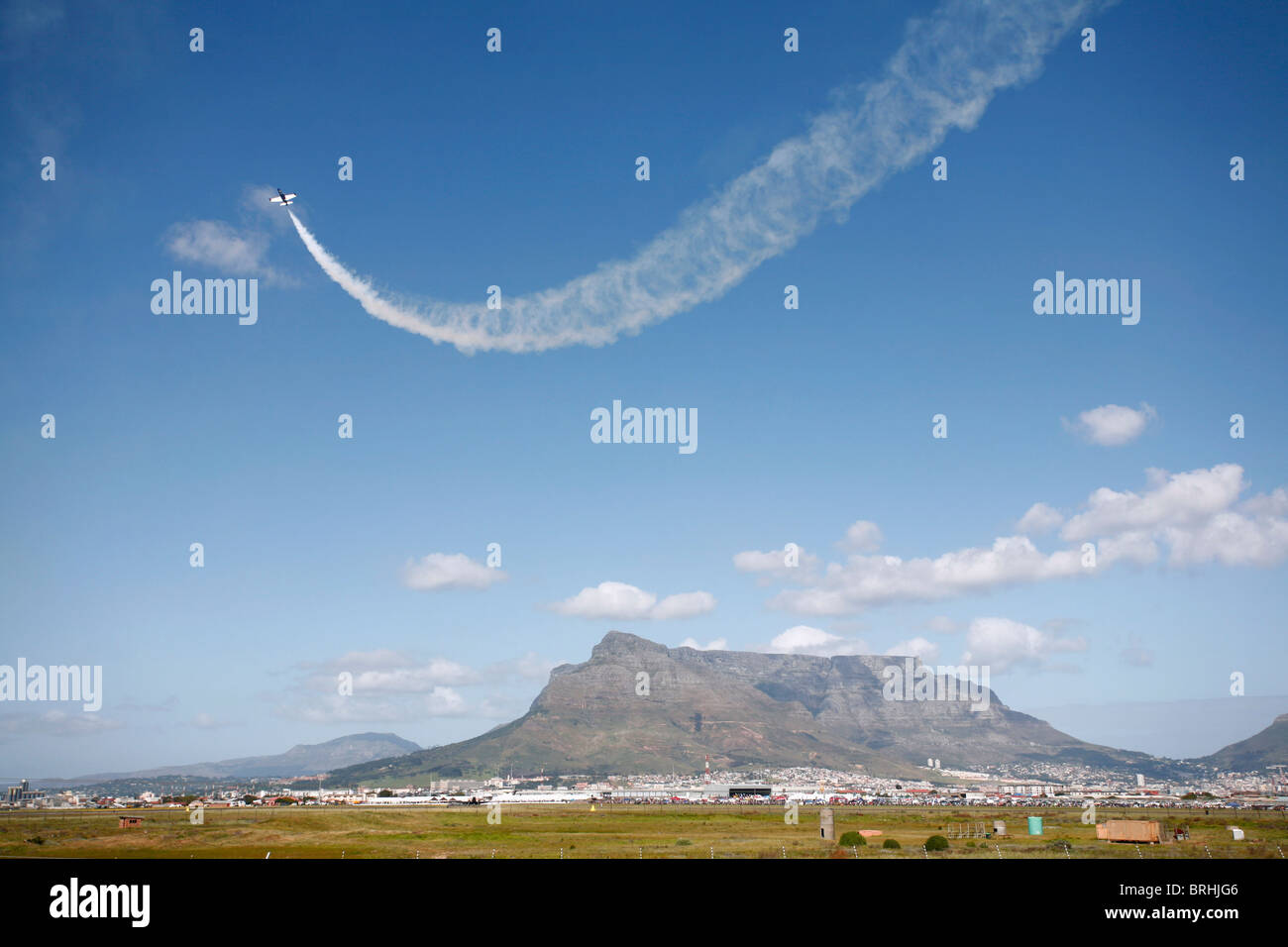 Vapour trail made by aeroplane flying above Table Mountain, Cape Town ...