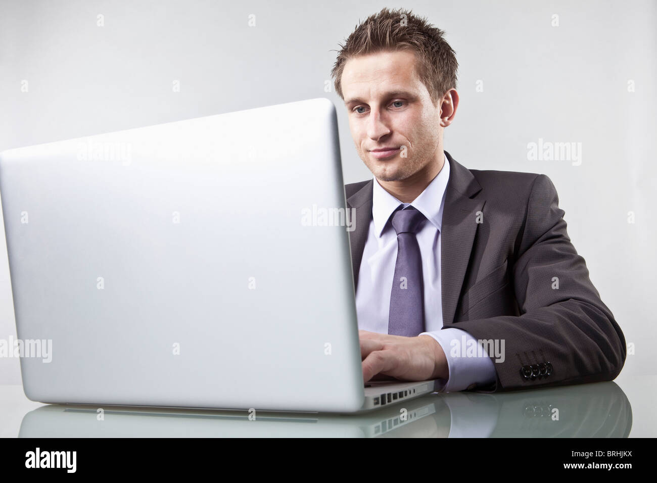 Businessman Using Laptop Computer Stock Photo - Alamy
