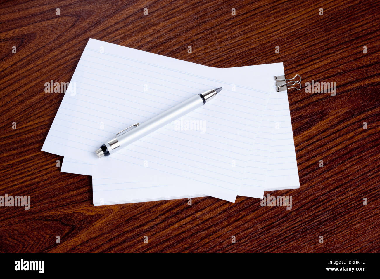 Pen and Papers on Desk Stock Photo - Alamy